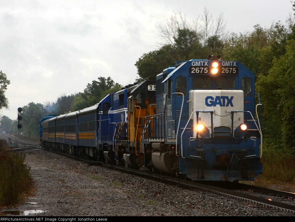GMTX 2675 leads SRI's Hamburg RR Days Excursion train north through the rain